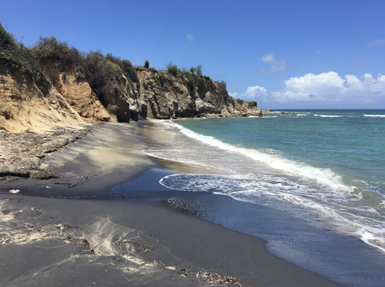 The 25+ Most Beautiful Black Sand Beaches In The World