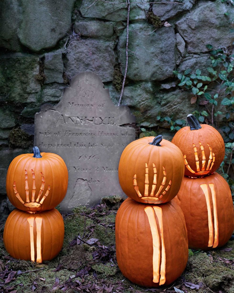 pumpkin-carving-ideas-skeletal-hand-arm-2-tier-jackolanterns-1657827681